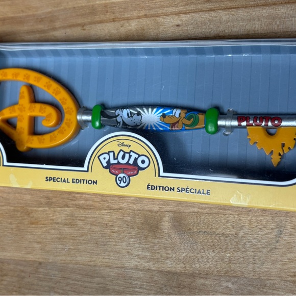 Disney | Toys | New Disney Pluto 9th Anniversary Key In Orange And ...